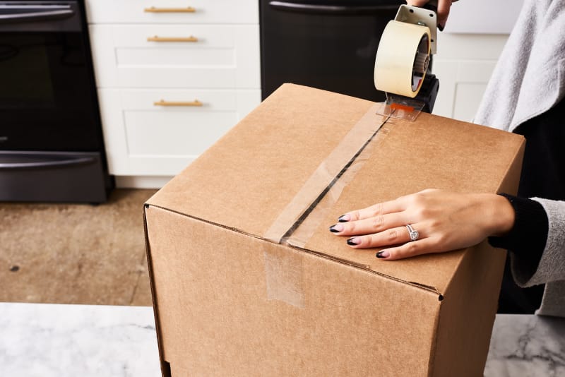 The Best Way To Fold And Tape Boxes For Moving Apartment Therapy