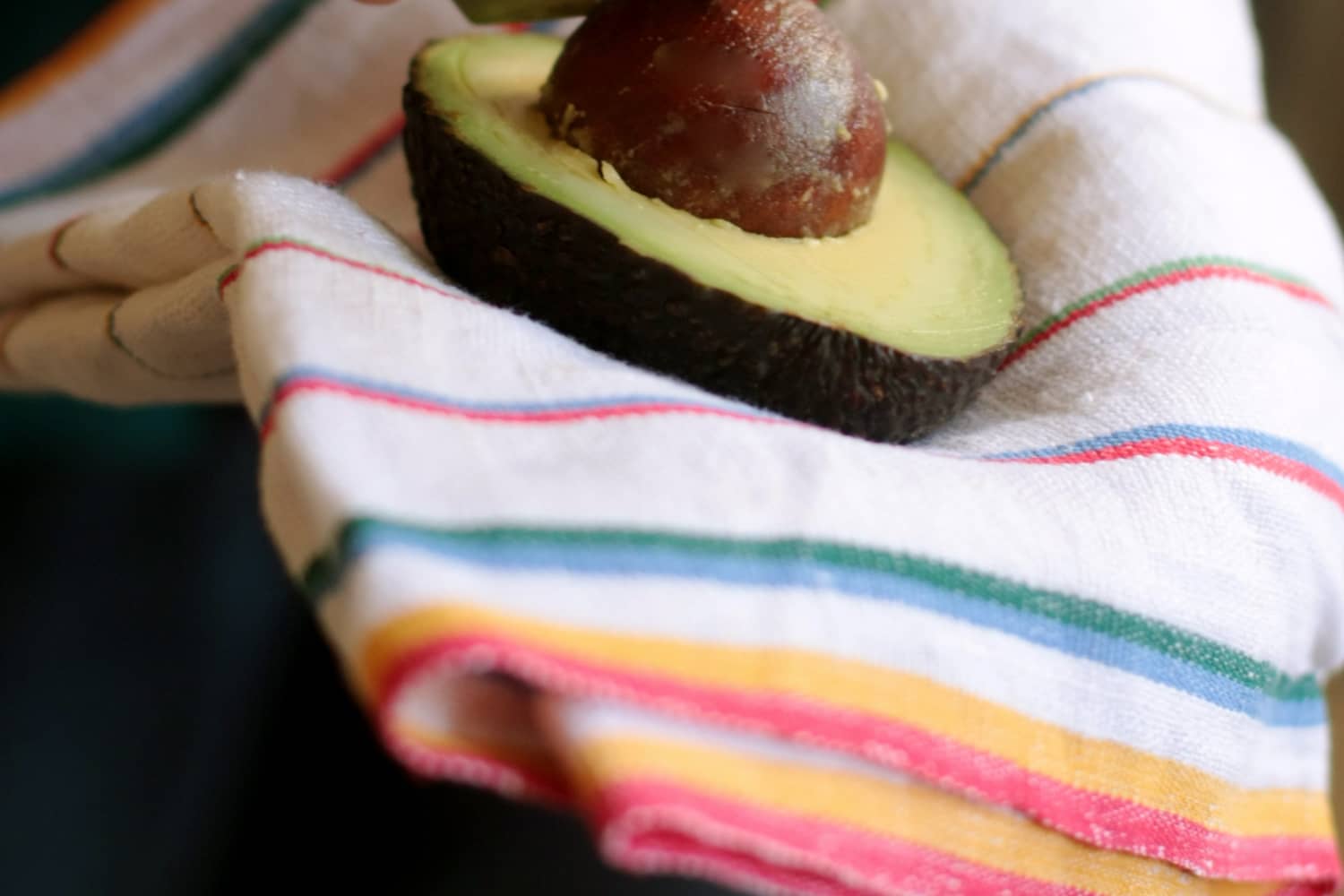 How To Remove an Avocado Pit with a Chef’s Knife | The Kitchn