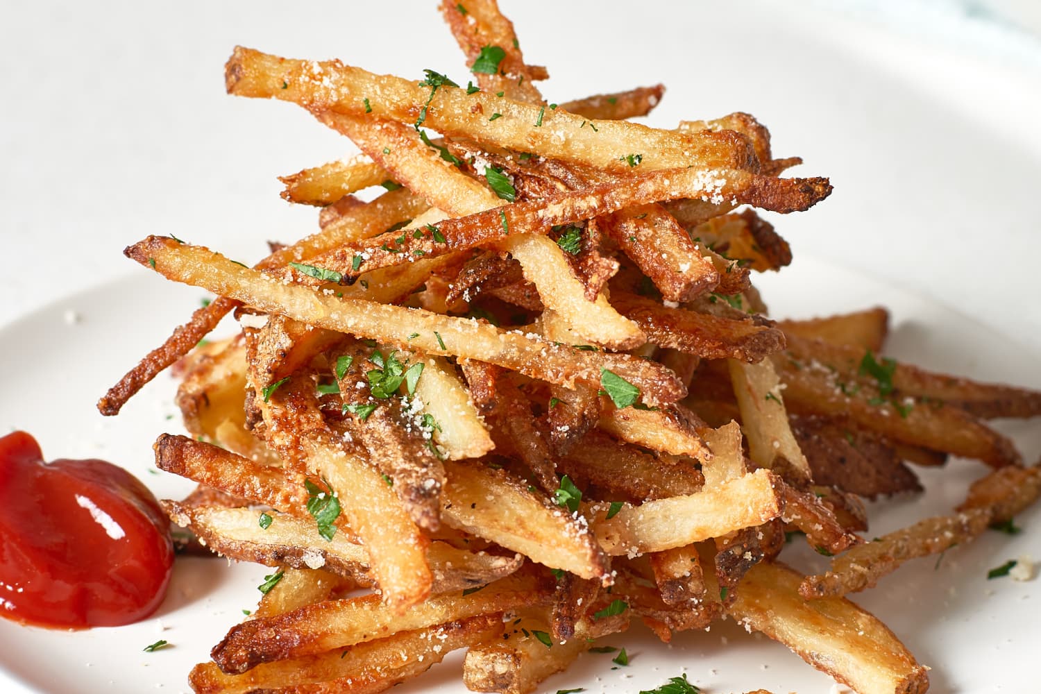 Garlic Parmesan Fries Recipe (Easy Baked Version) | The Kitchn