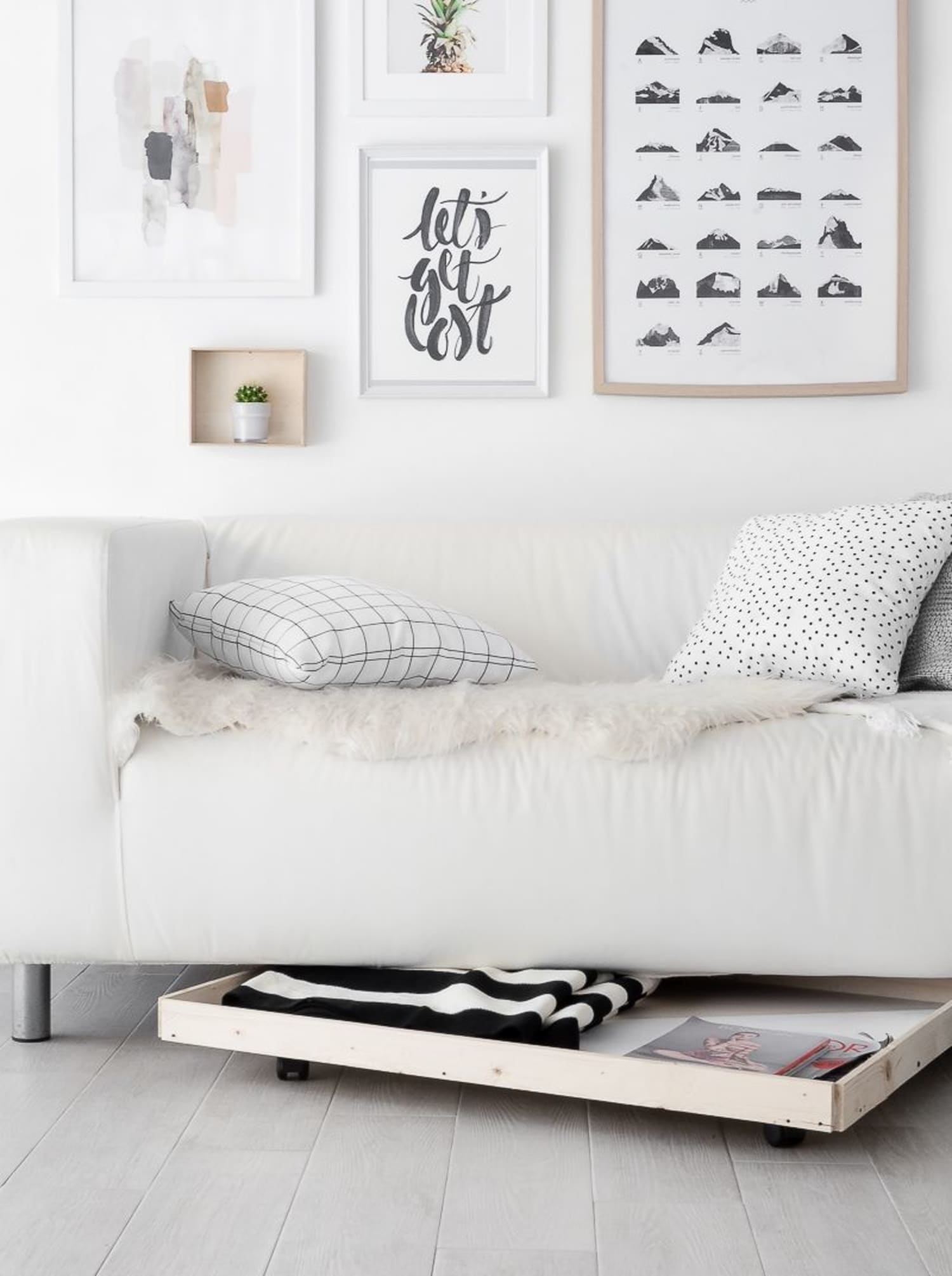 9 Ways to Add Storage Using the Area Under Your Sofa | Apartment Therapy