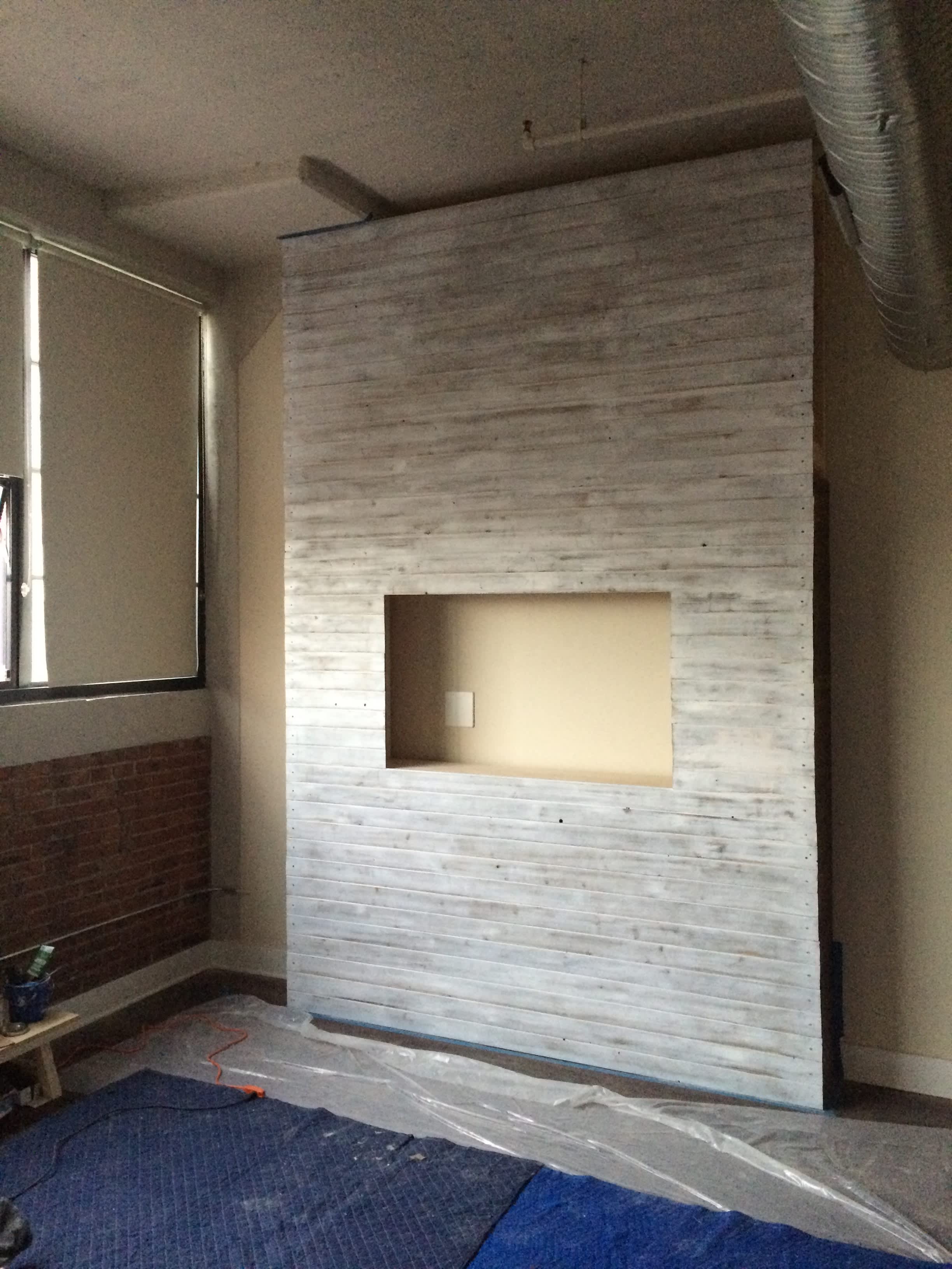 How To Make a TV-Hiding Sliding Art Accent Wall | Apartment Therapy