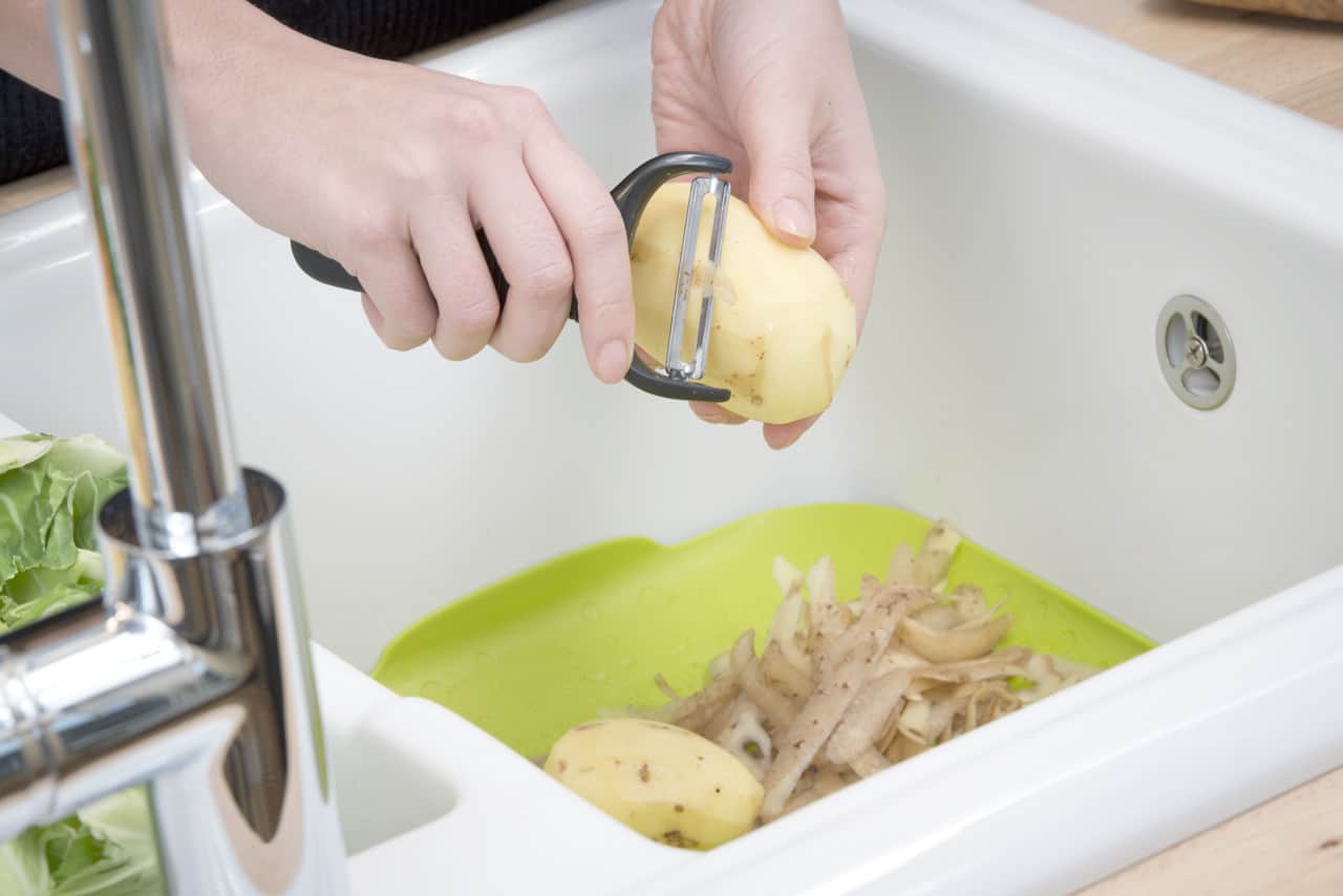 Sinkstation: A Flat Colander For Food Prep | Kitchn