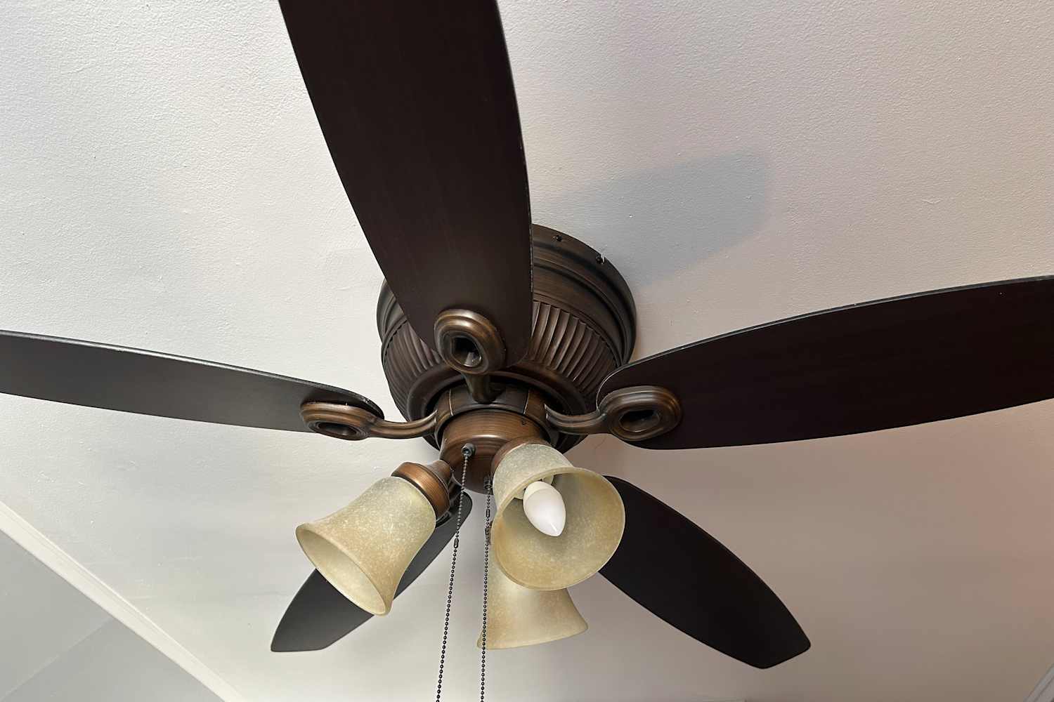 A Smart Trick for Keeping Ceiling Fans Clean | Apartment Therapy
