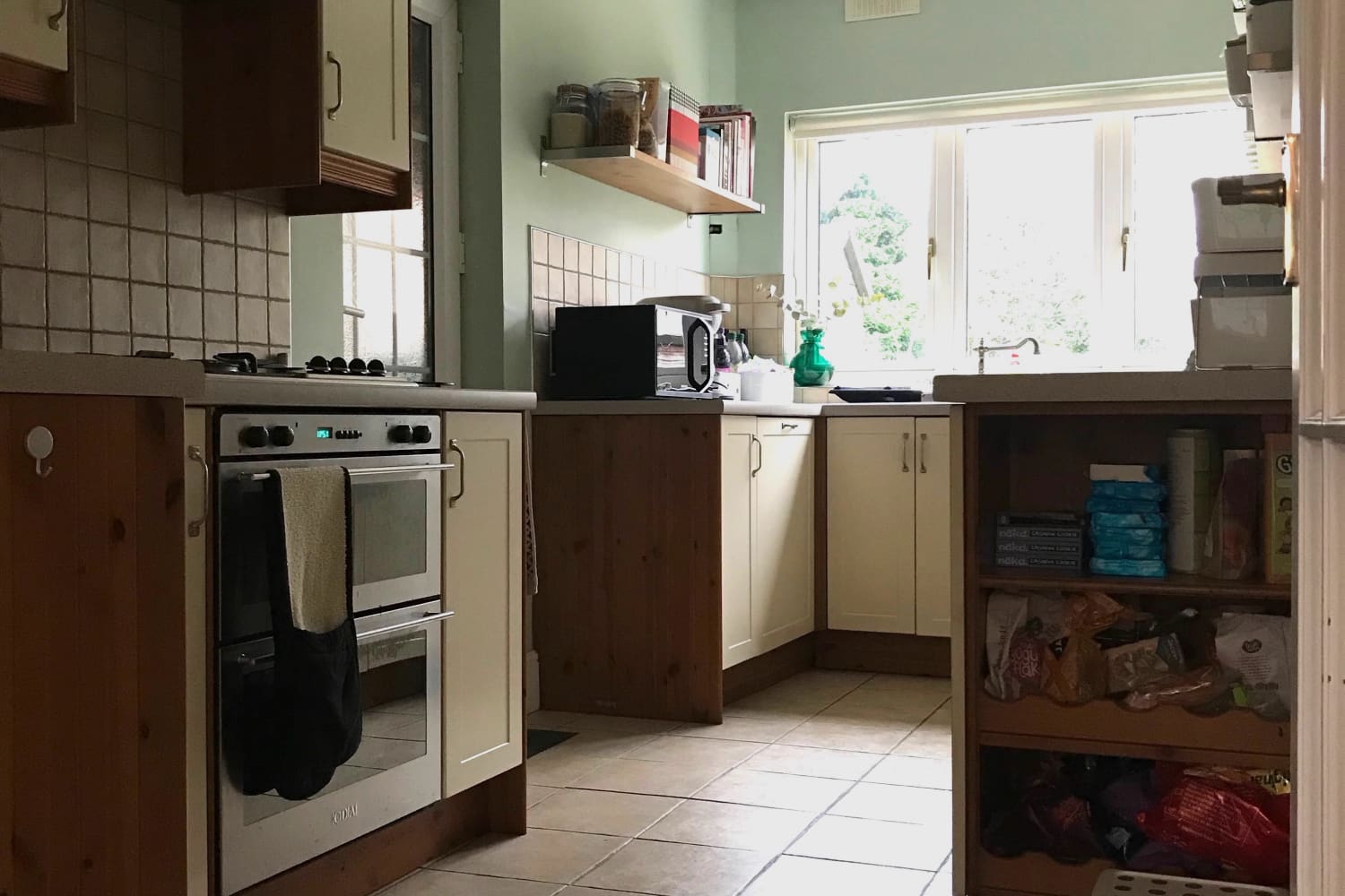 Open-Concept Kitchen with Open Shelves and Dark Base Cabinets ...