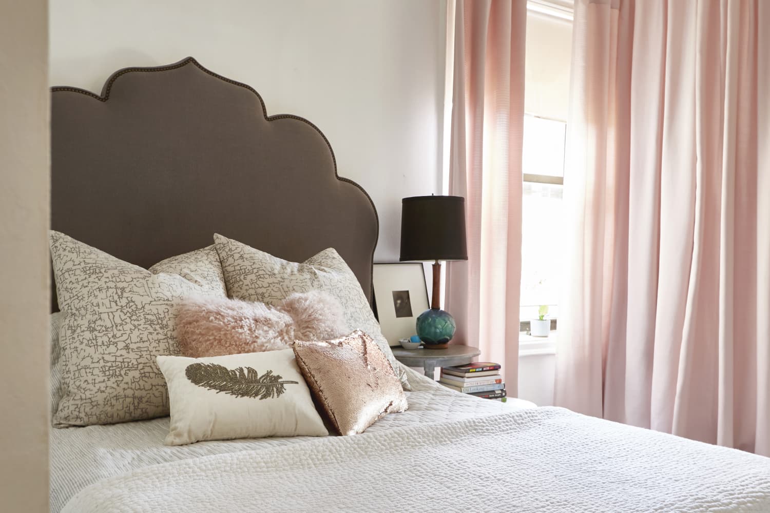 Here's a Smart Way to Gain More Bedside Space in a Tiny Bedroom ...