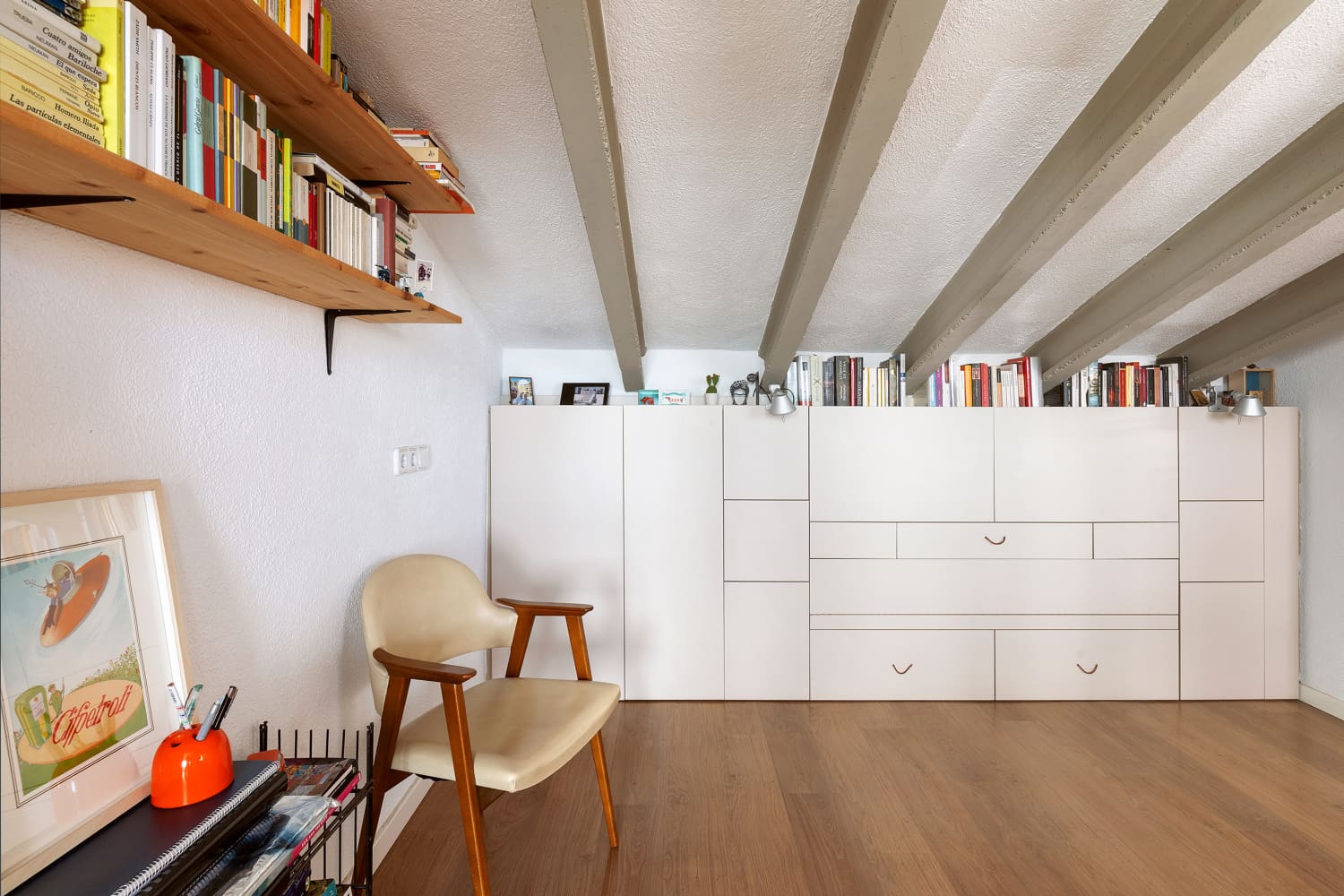See How Builts-Ins Make a Teeny Attic Apartment Feel Bigger | Apartment ...