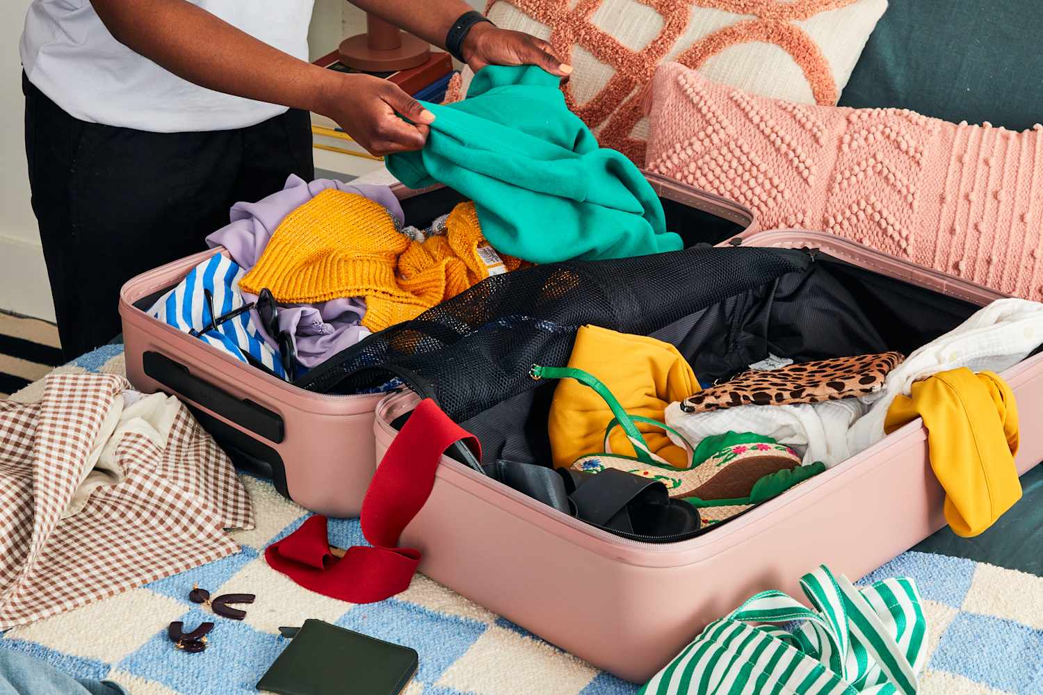 Rolling Clothes for Packing a Suitcase Is So Brilliant | Apartment Therapy