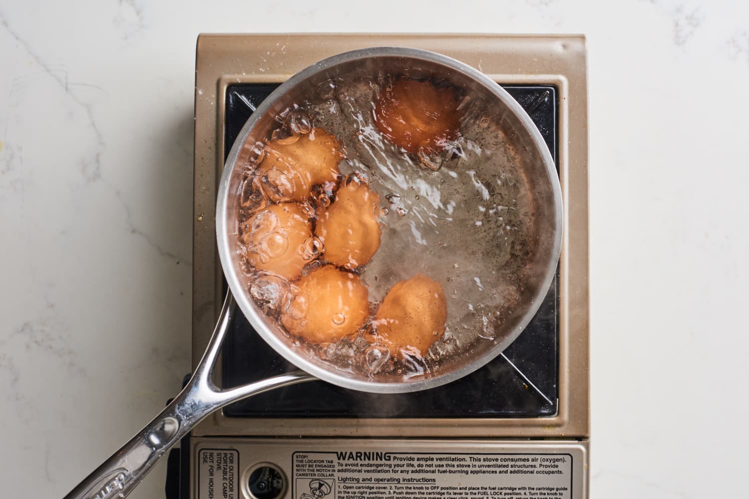 how to boil off water quickly