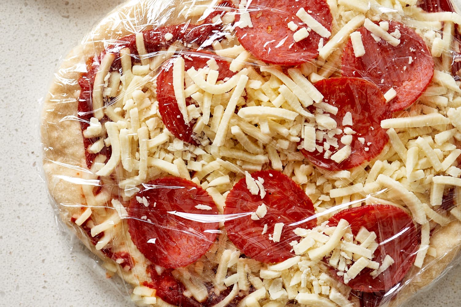 how to cook a raw pizza
