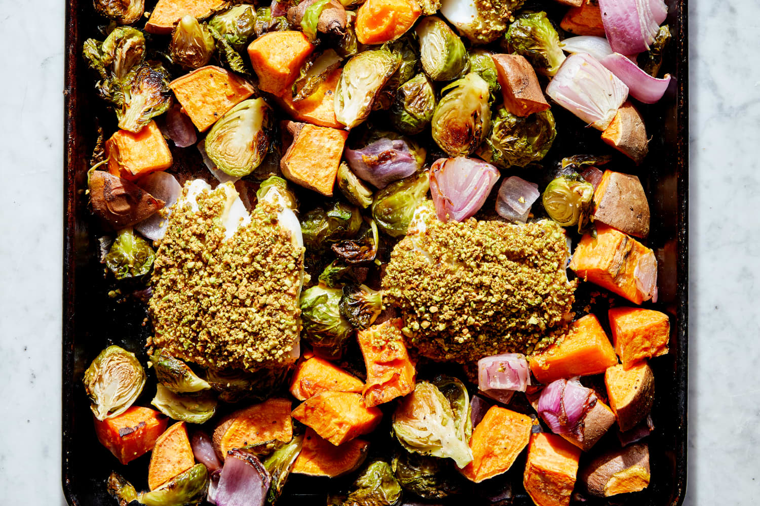Sheet Pan Pistachio-Crusted Cod with Fall Vegetables | The Kitchn