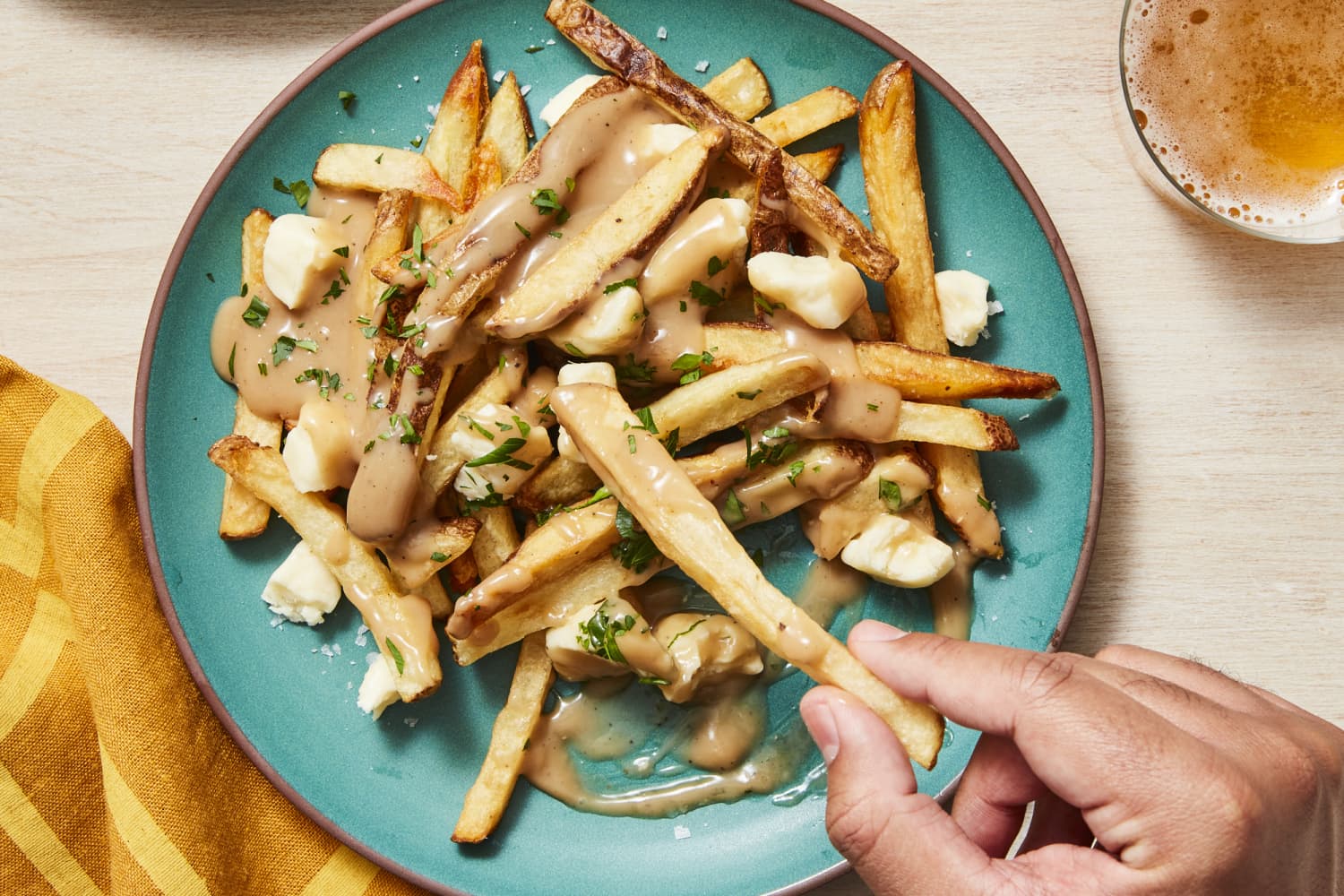 Poutine Recipe (Homemade Fries with Gravy and Cheese Curds) | The Kitchn