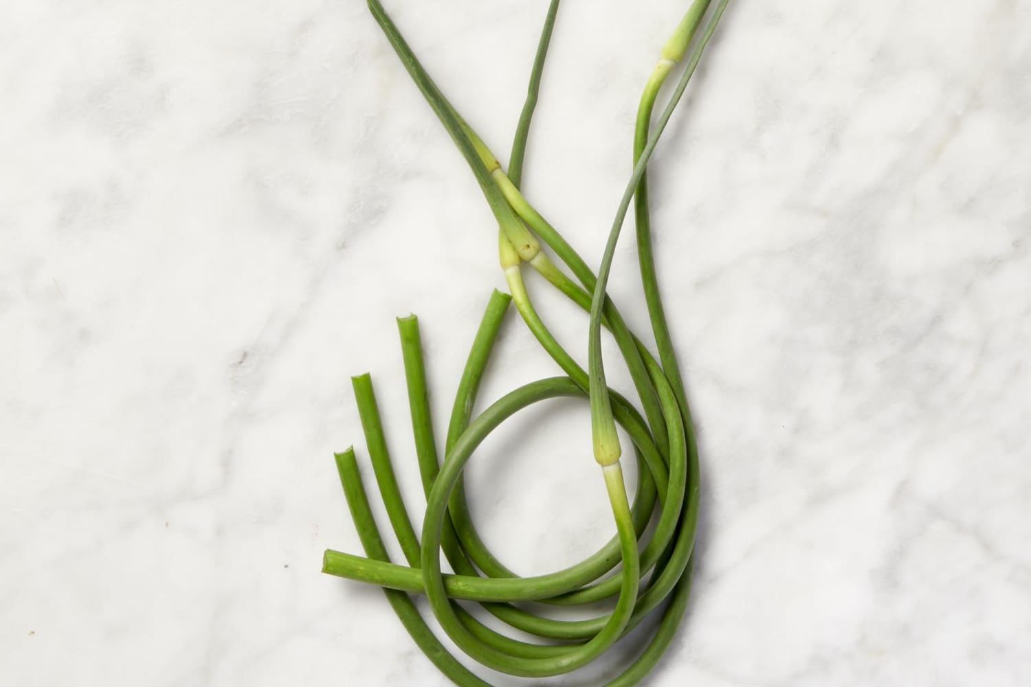 What Are Garlic Scapes and How Do You Cook With Them? | The Kitchn