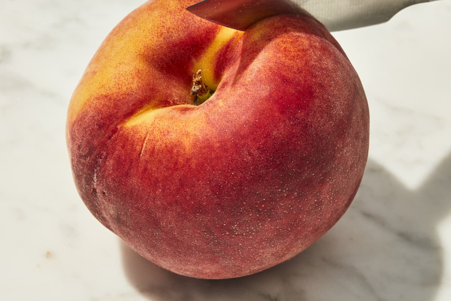 The Best Way to Cut a Peach: A Step-by-Step Visual Guide | The Kitchn