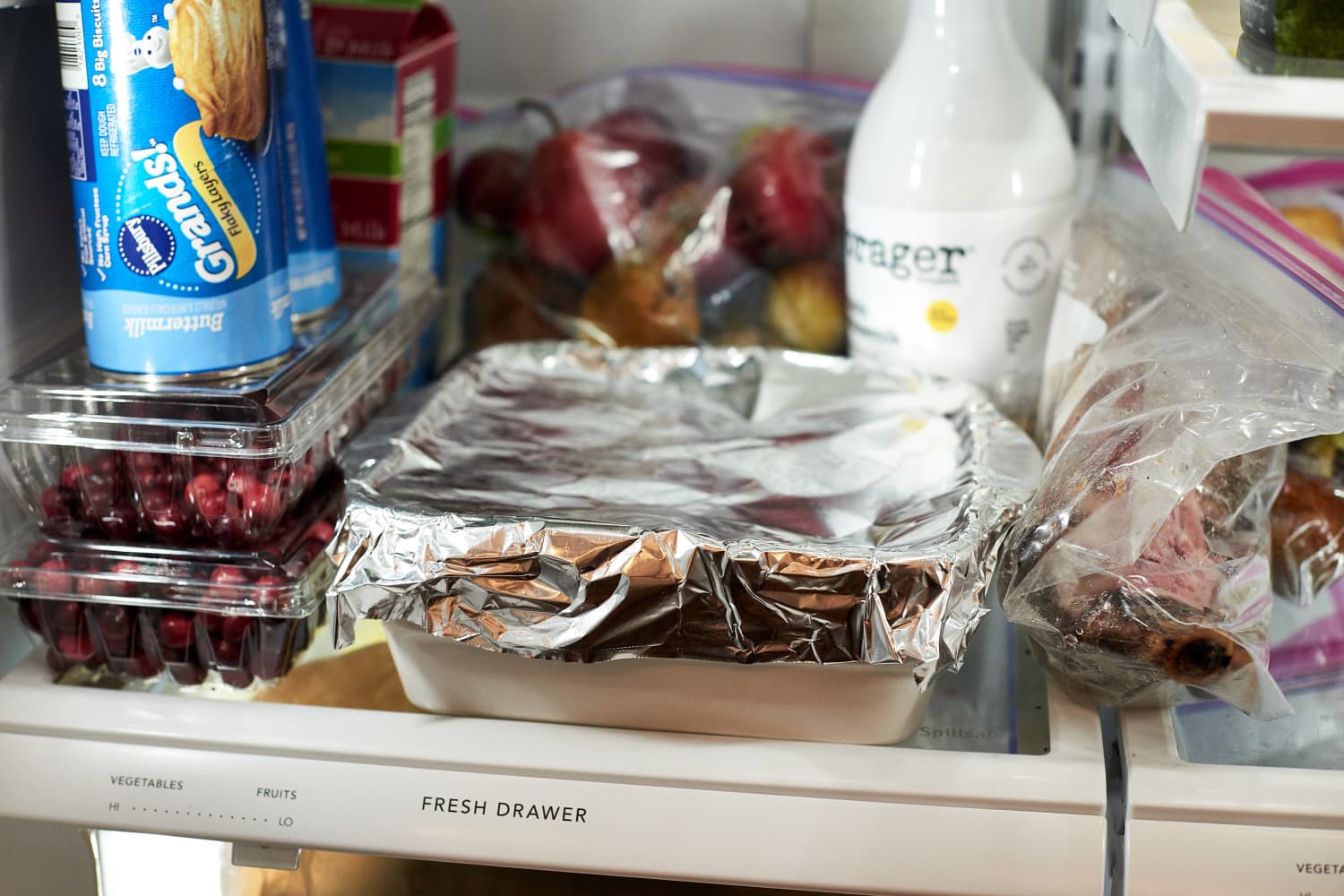 This Brilliant Hack Adds a Shelf’s Worth of Space to Your Fridge ...