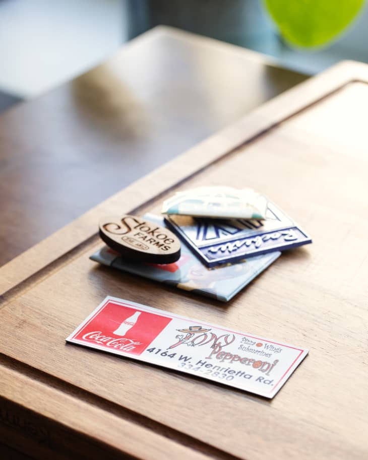 A Smart Way to Reuse Those Ugly Promotional Magnets | The Kitchn