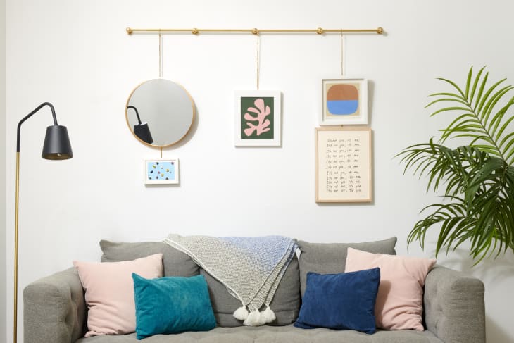 A Brass Picture Rail Will Instantly Level Up Gallery Wall | Apartment ...