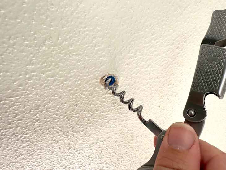 How to Remove Drywall Anchors with a Wine Corkscrew | Apartment Therapy