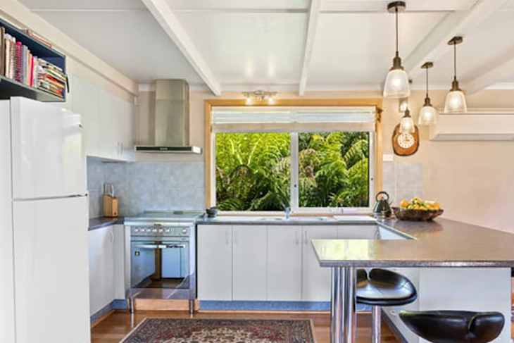 A “Crowded & Dark” ’90s Kitchen Gets a Cheery $1,500 Makeover ...