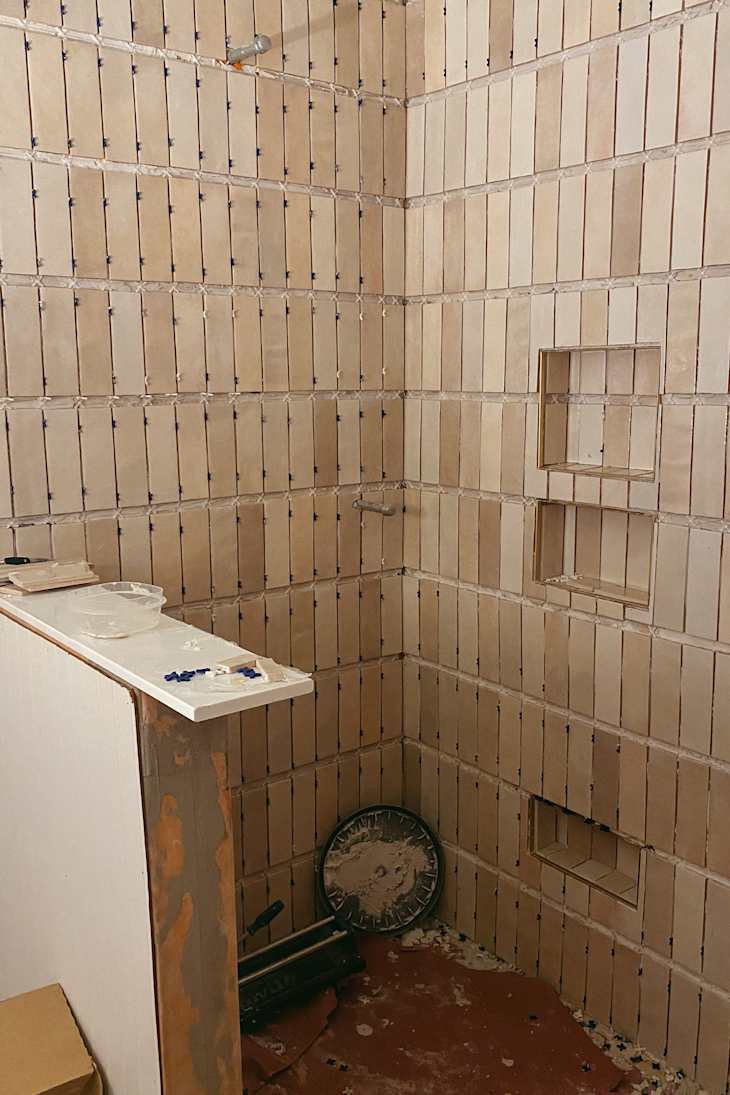 How My Bathroom’s Chunky Grout Has Held Up in 1 Year | Apartment Therapy