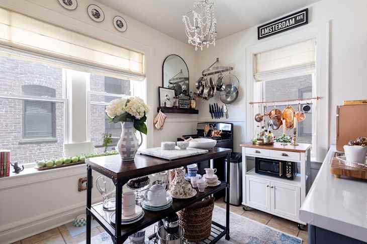 Hanging a Pot Rack in Front of a Window Is a Brilliant Idea | Apartment ...