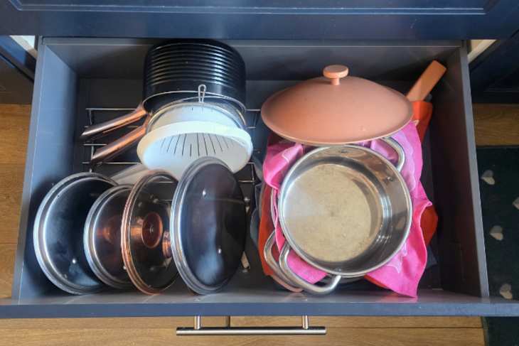 A Pro Organizer Fixed My Messy Kitchen Drawer Full of Pans | Apartment ...