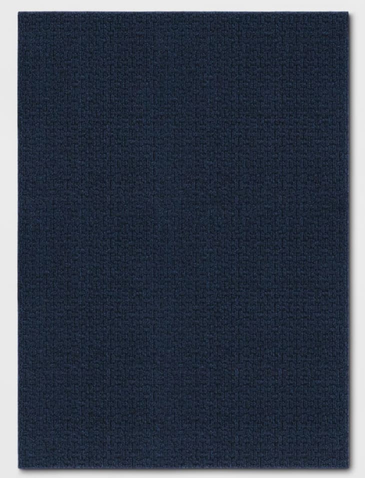 Here's Why You Should Consider Decorating With a Solid Colored Rug ...