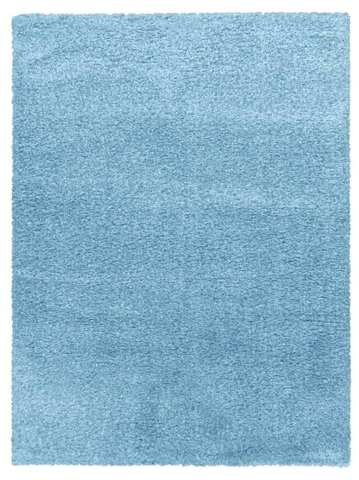 Here's Why You Should Consider Decorating With a Solid Colored Rug ...