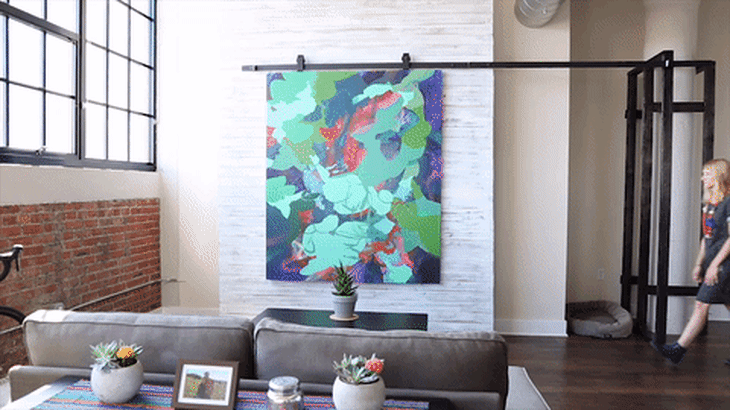 How To Make a TV-Hiding Sliding Art Accent Wall | Apartment Therapy