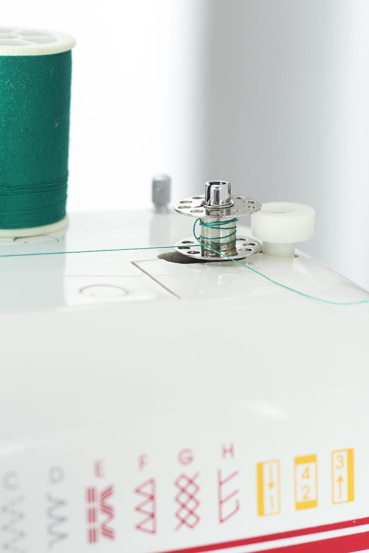 How To Thread a Sewing Machine & Wind a Bobbin | Apartment Therapy