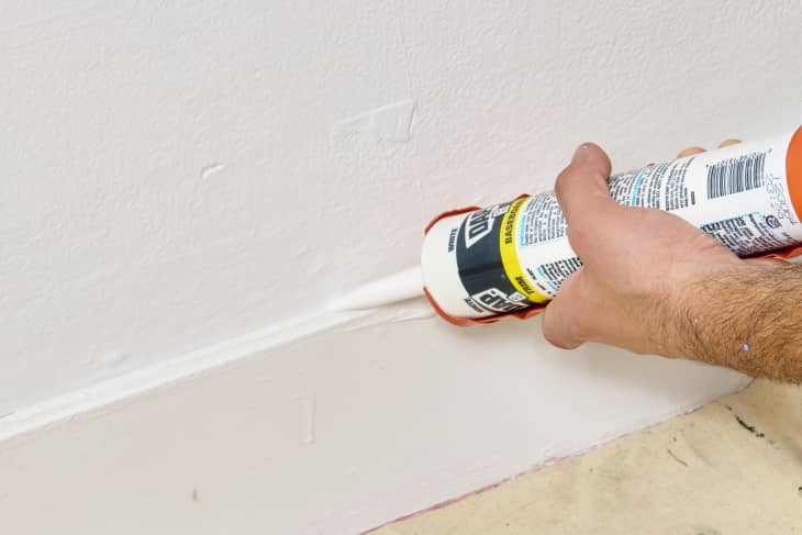 How to Load a Caulk Gun Like a Pro, According to a Handyman | Apartment ...