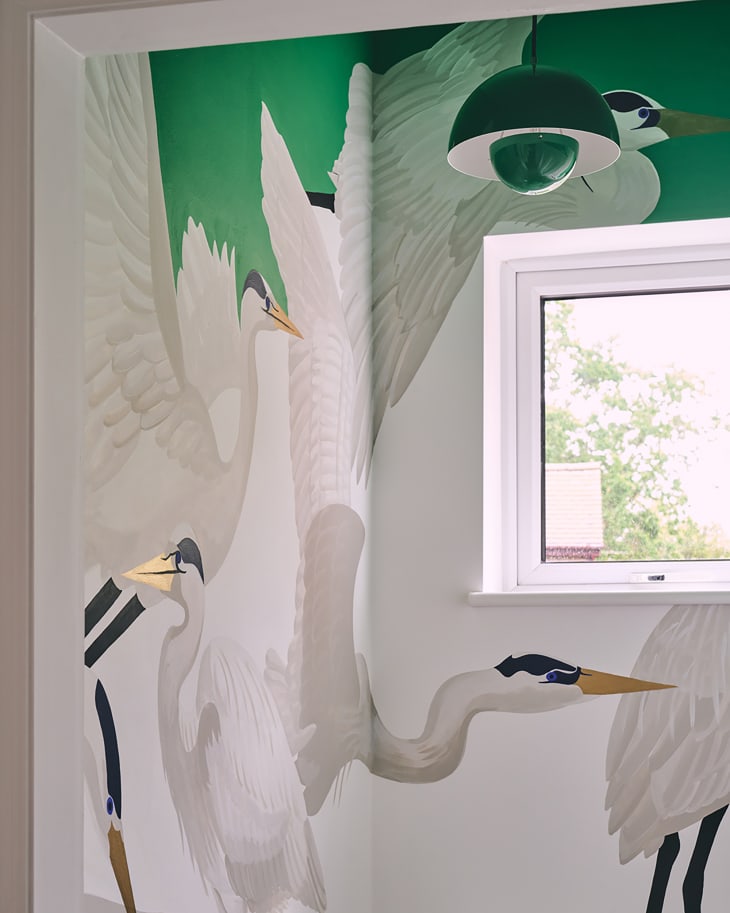 See a Green Bathroom Makeover with a Hand-Painted Bird Mural ...