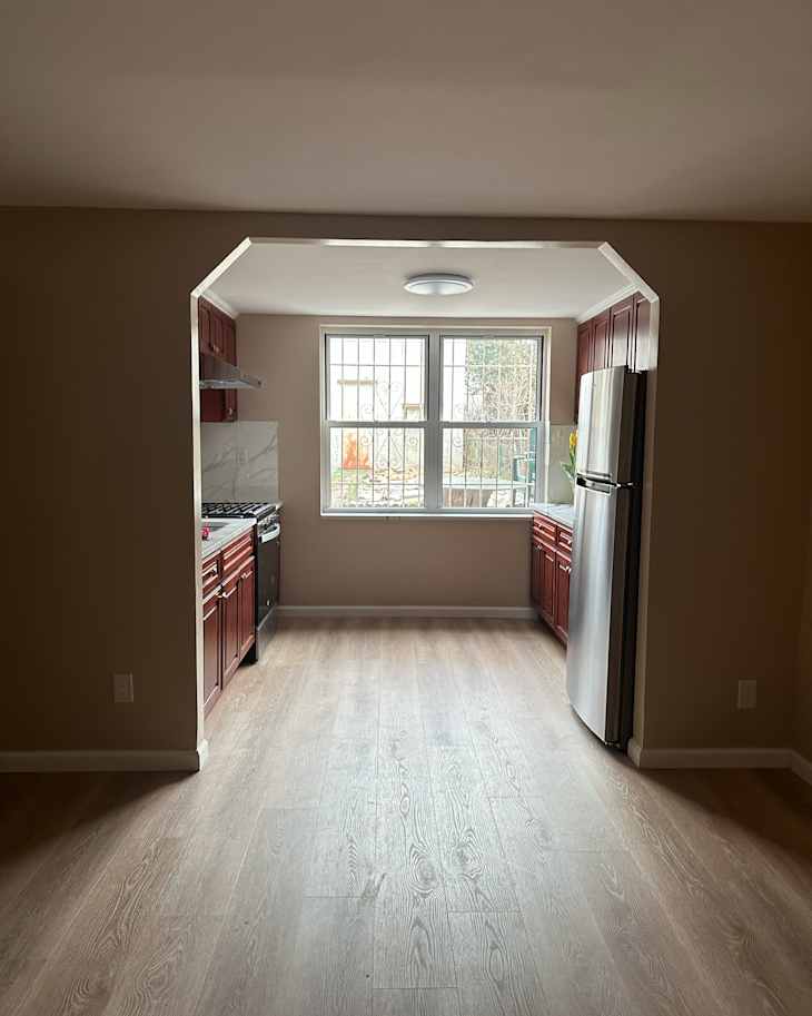 The Lesson in This Kitchen Makeover? Don’t Fight Brown Cabinets | The ...