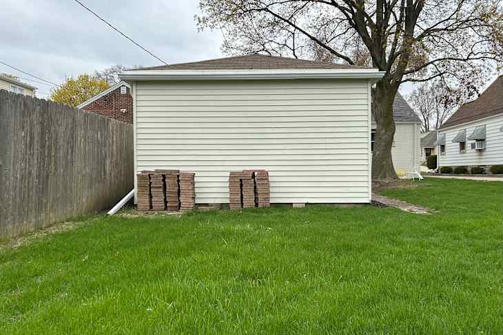 A DIY Paver Patio Added a Bonus Hangout Spot to My Yard | Apartment Therapy
