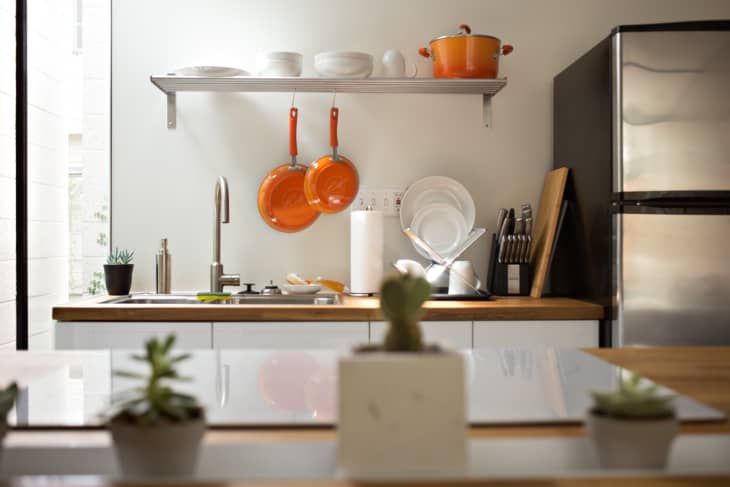 13 Tips for Keeping the Kitchen Clean While You're Cooking | Apartment ...