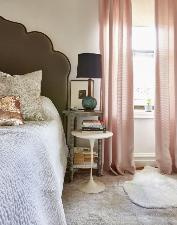 Here's a Smart Way to Gain More Bedside Space in a Tiny Bedroom ...