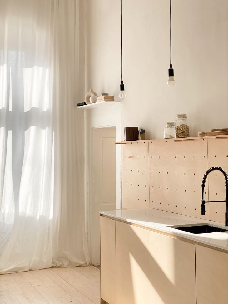 600 Square Foot Romanian Apartment With Plywood Kitchen | Apartment Therapy
