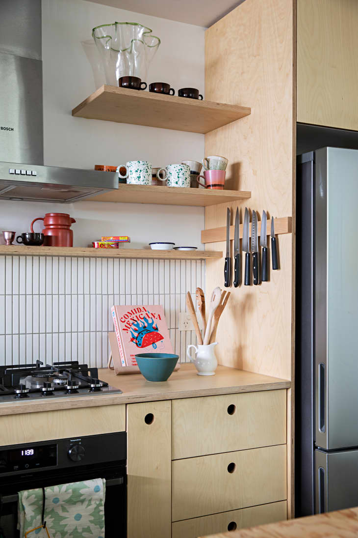 See a Renovated Loft with Built-In Storage & Plywood Shelves ...