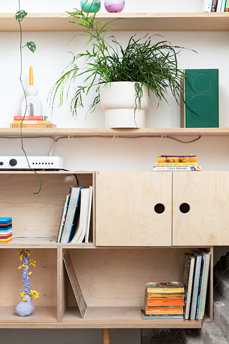 See a Renovated Loft with Built-In Storage & Plywood Shelves ...