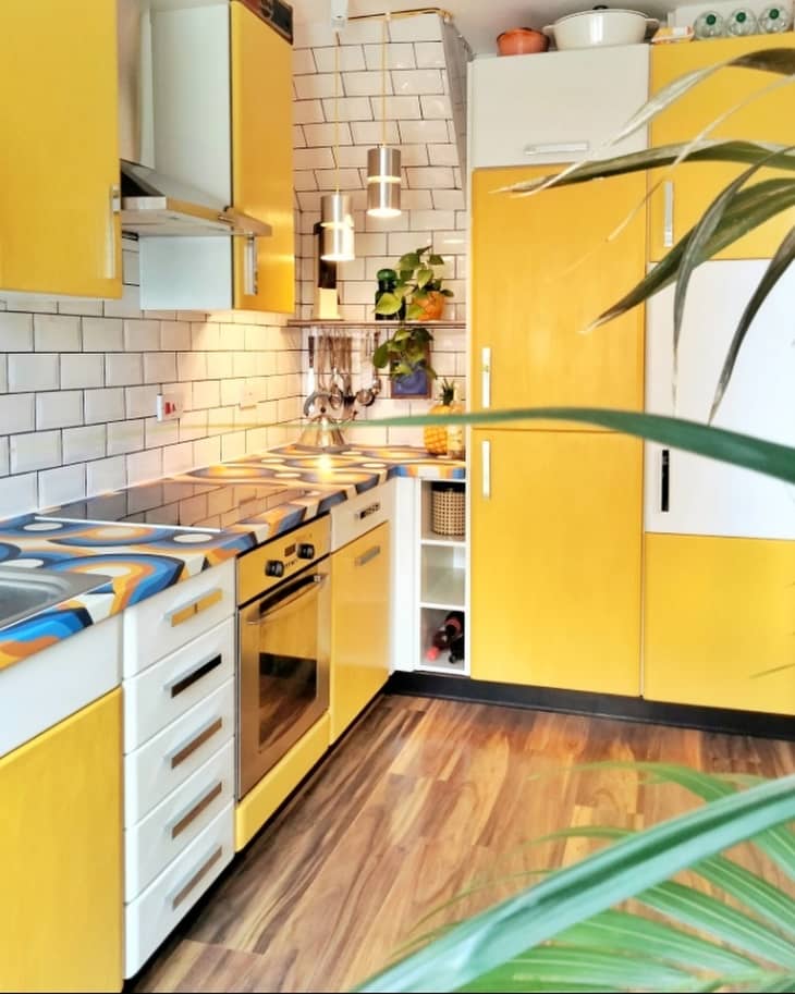 Before & After: Yellow Cabinets and ‘70s Prints Revive This Space | The ...