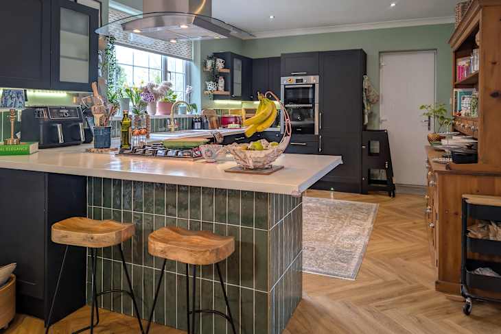 Black Cabinets and Green Subway Tiles Refresh This Kitchen | The Kitchn