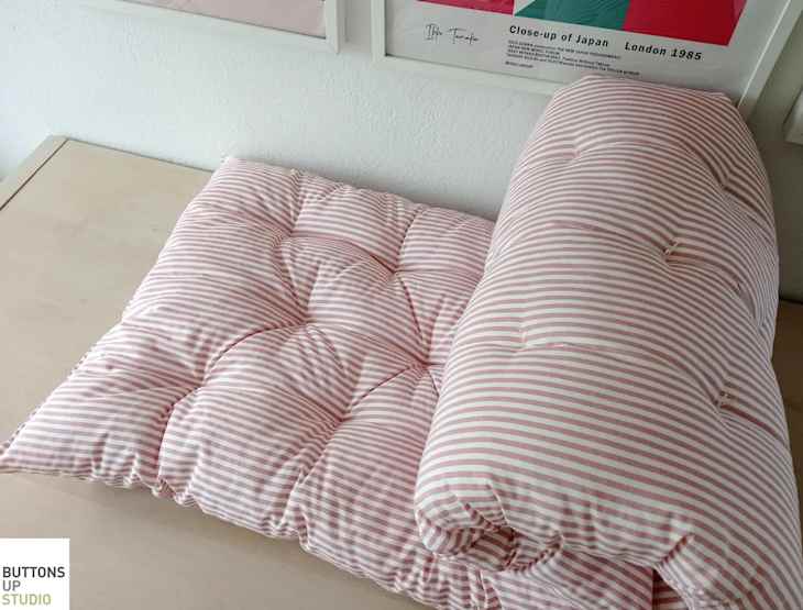 Your Living Room Needs a Sofa Topper — Here's Why | Apartment Therapy