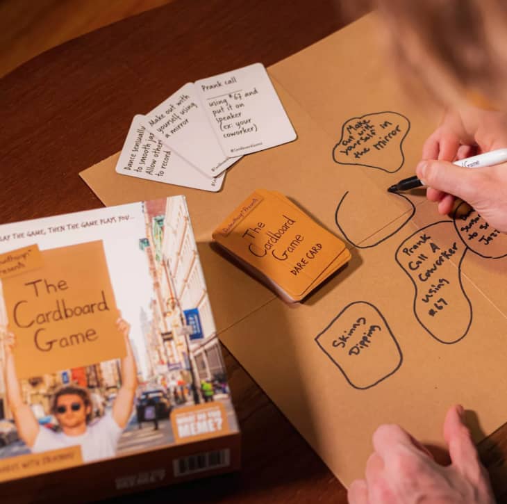 What Do You Meme Releases Dude With Sign Cardboard Game | Apartment Therapy