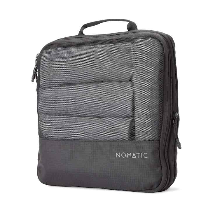 Rolling Clothes for Packing a Suitcase Is So Brilliant | Apartment Therapy