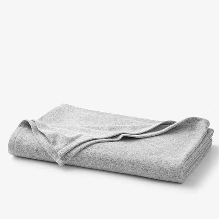 The Company Store's Sweatshirt Blanket Is My Coziest Bed Layer ...