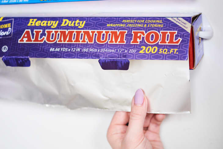 Foil Parchment Paper Storage Hack - Command Hook Trick | The Kitchn