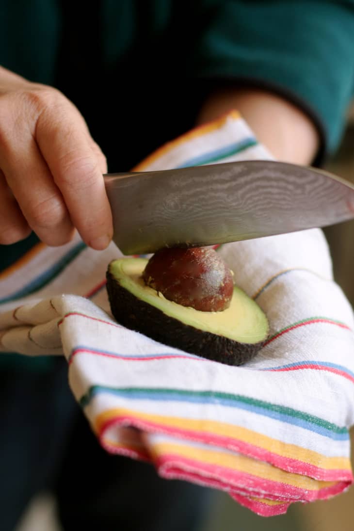 How To Remove an Avocado Pit with a Chef’s Knife | Kitchn