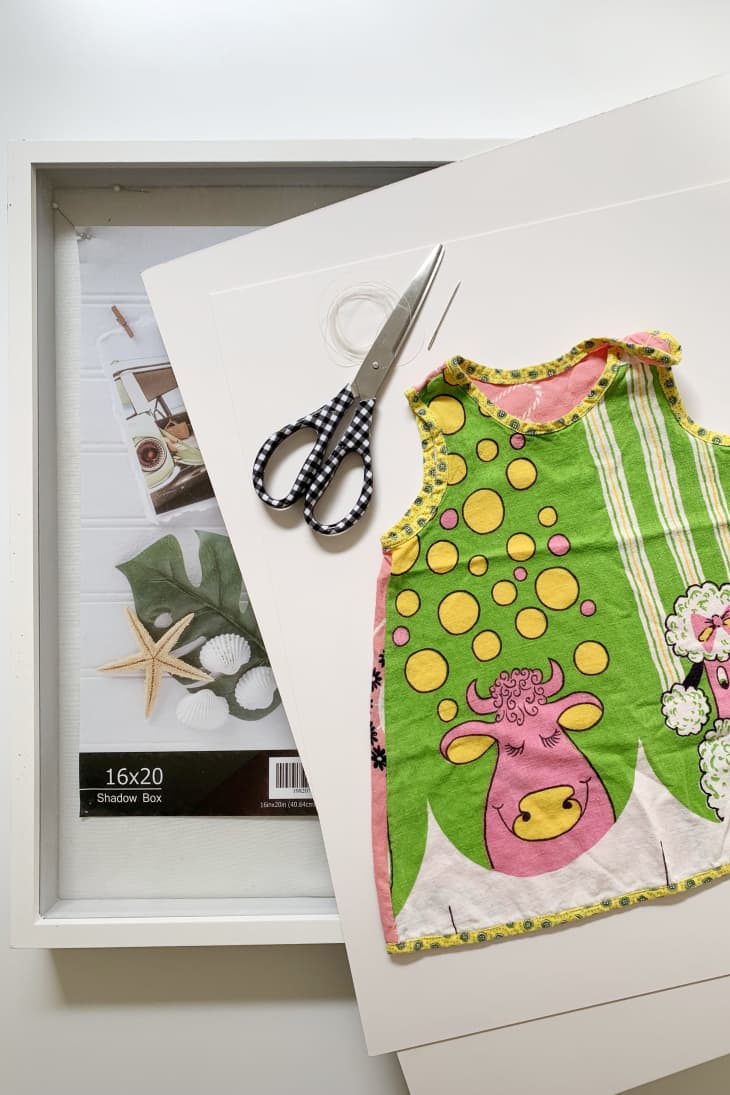 How to Frame an Heirloom Piece of Kids Clothing | Cubby