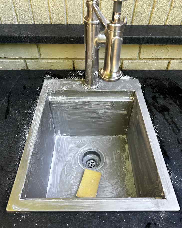 I Tried This $7 “Miracle in a Can” on My Gunky, Stained Outdoor Sink ...