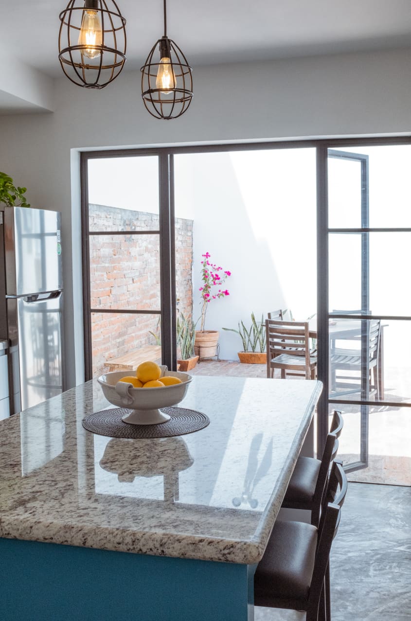 This Dilapidated Mexico House Has a Gorgeous New Island and Concrete ...