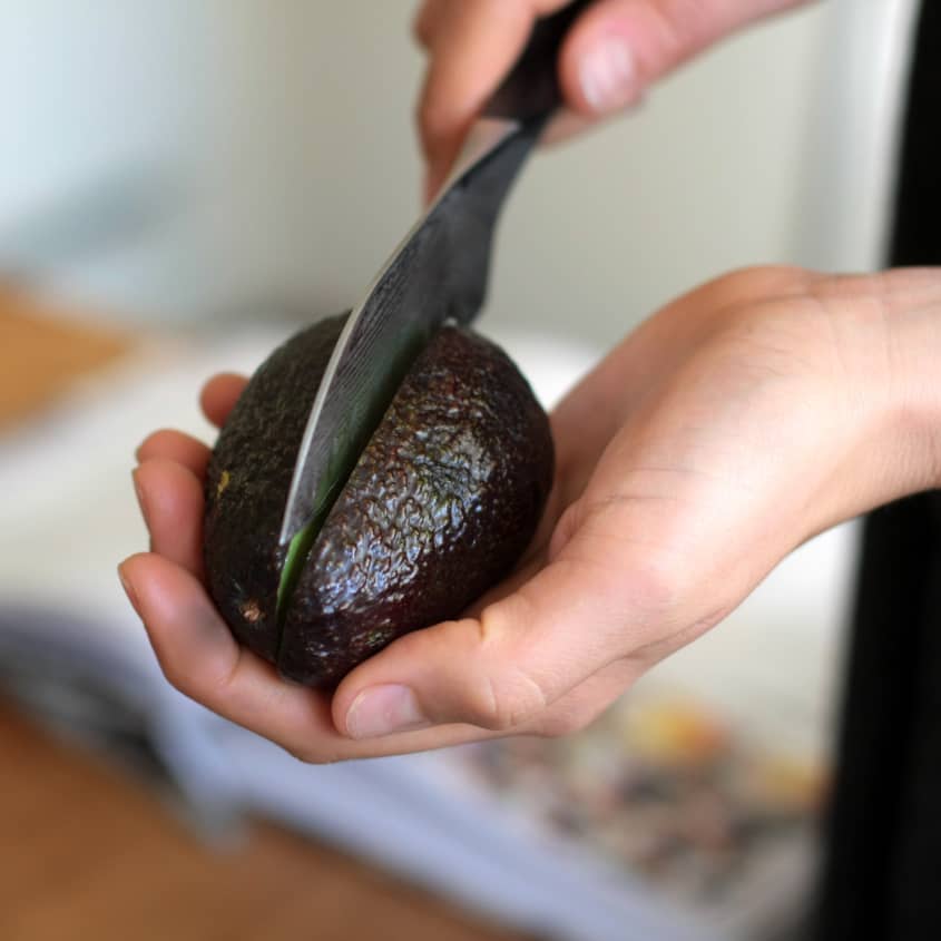 How To Remove an Avocado Pit with a Chef’s Knife | The Kitchn